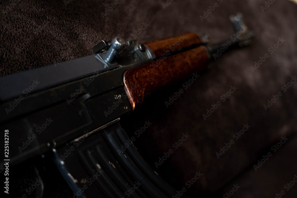 Low key photo of AK-47 Kalashnikov rifle. Dark themed automatic rifle ...