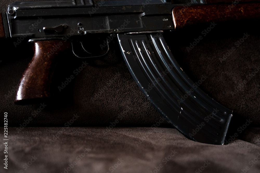 Poster Low key photo of AK-47 Kalashnikov rifle – Wall Art | UkPosters