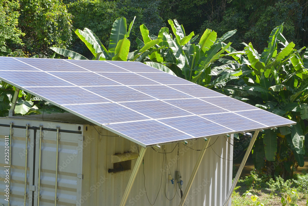 container box with solar panels Stock Photo | Adobe Stock