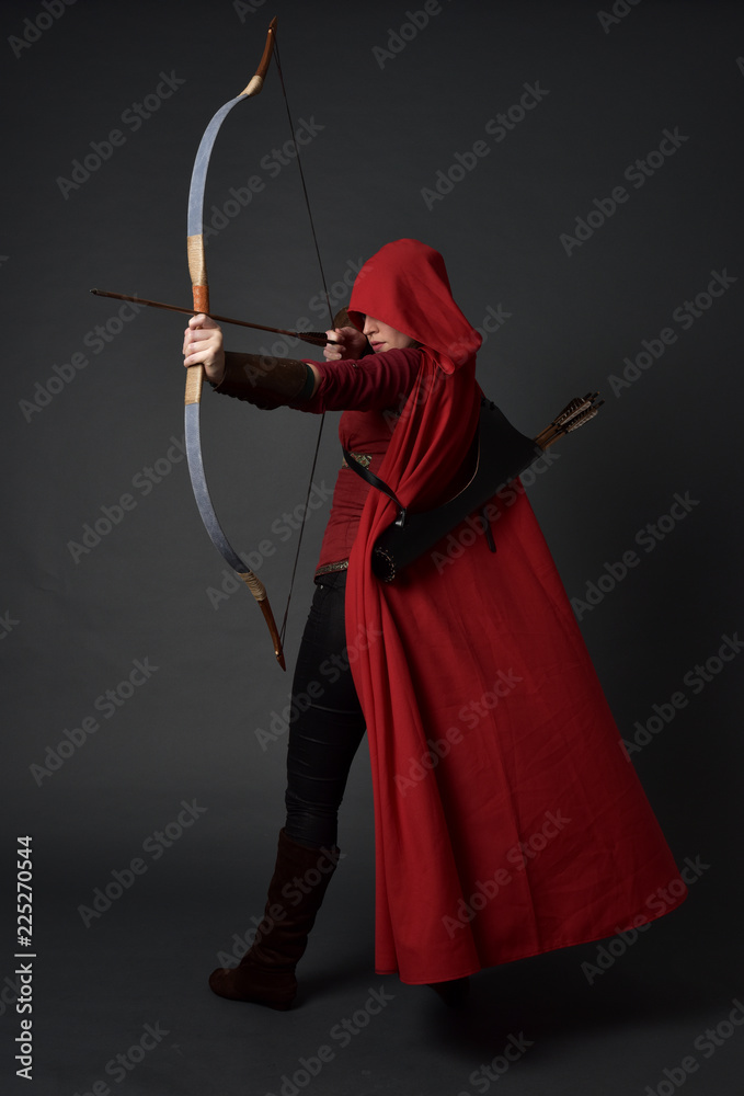 full length portrait of brunette girl wearing red medieval costume and ...