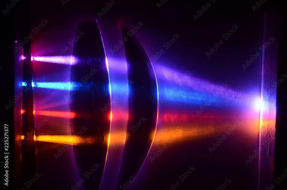 Light beams in colorblind-friendly colors pass trough a demonstration ...