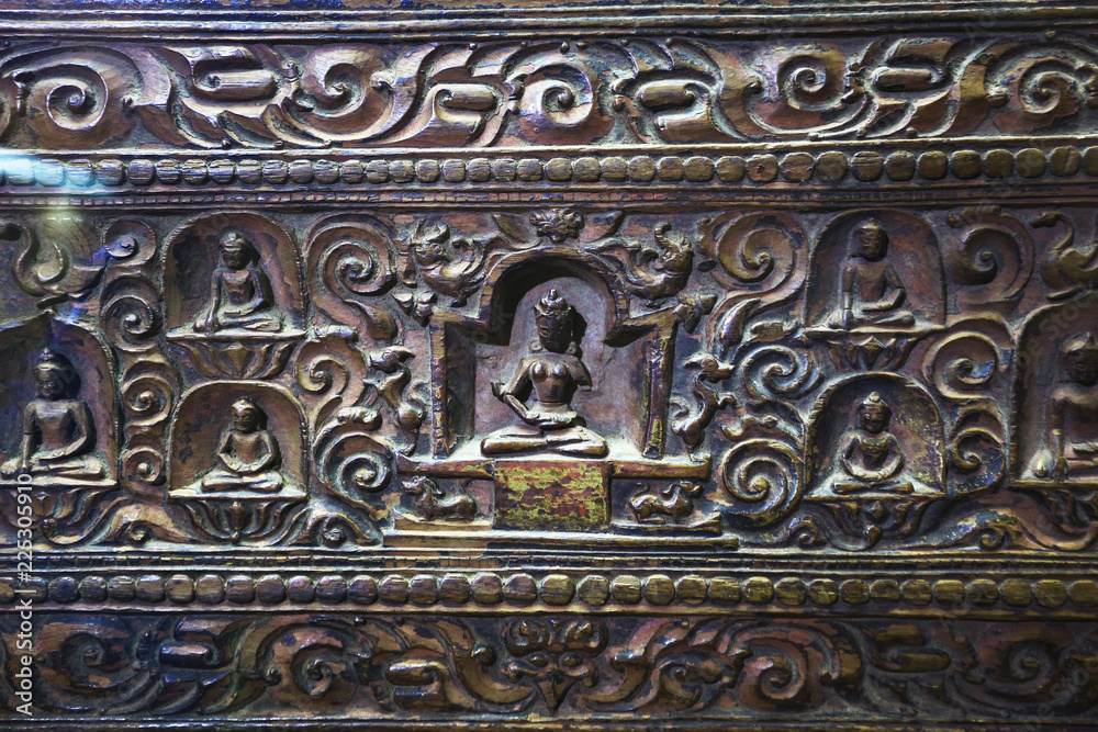 Buddhist religious symbols inscriptions in Tibet old runes Stock Photo ...