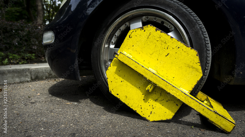 fitted bracket on an improperly parked car. attaching brackets to cars ...