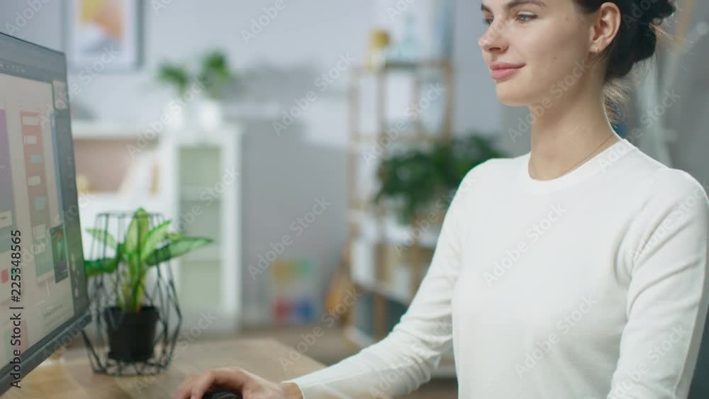 Vidéo Stock Beautiful Female Software Engineer Works on a UX / UI ...