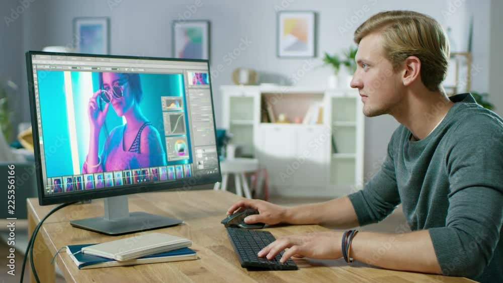 Professional Photographer Works in Photo Editing App / Software on His ...