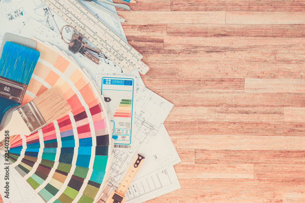 Interior designer's working table with energy rating chart ...