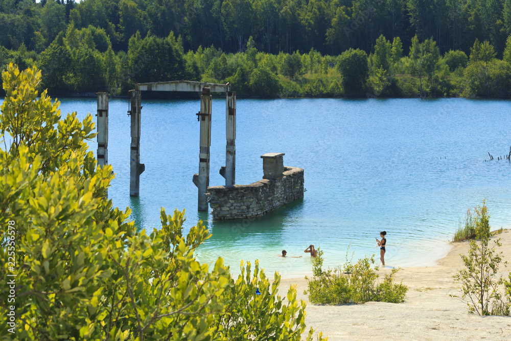 Abandoned sunken ruins of Soviet time prison in Rummu quarry. foto de ...