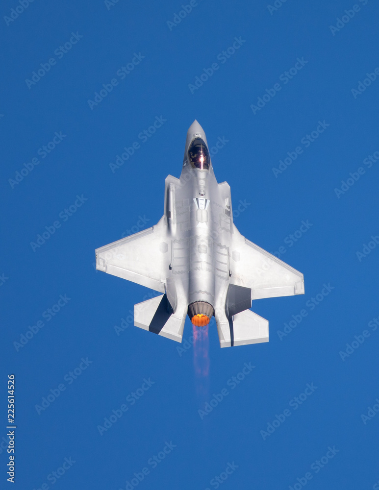 Very close top view of an F-35 Lightning II with afterburner on Stock ...