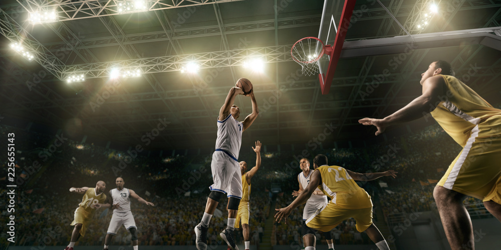 Basketball players on big professional arena during the game ...