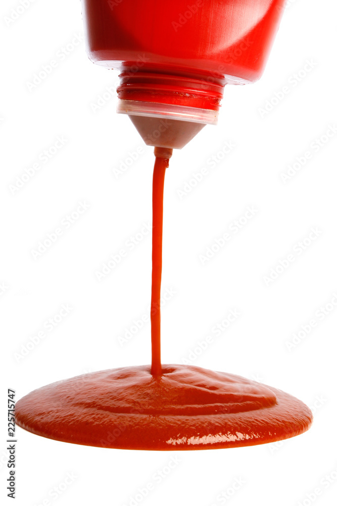pouring ketchup from bottle on white background Stock Photo | Adobe Stock