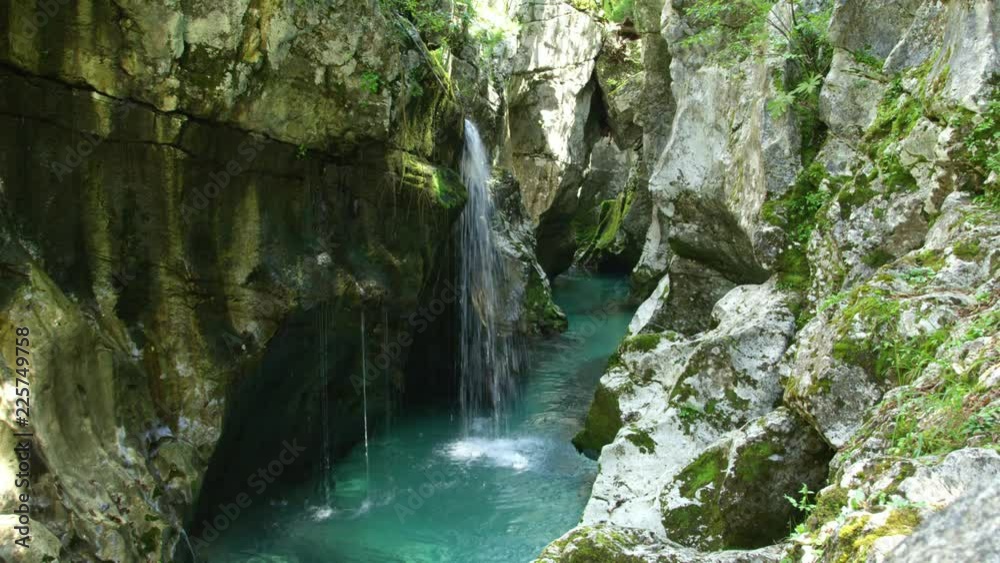 Loop of CLOSE UP: Scenic narrow gorge with waterfalls and river running ...
