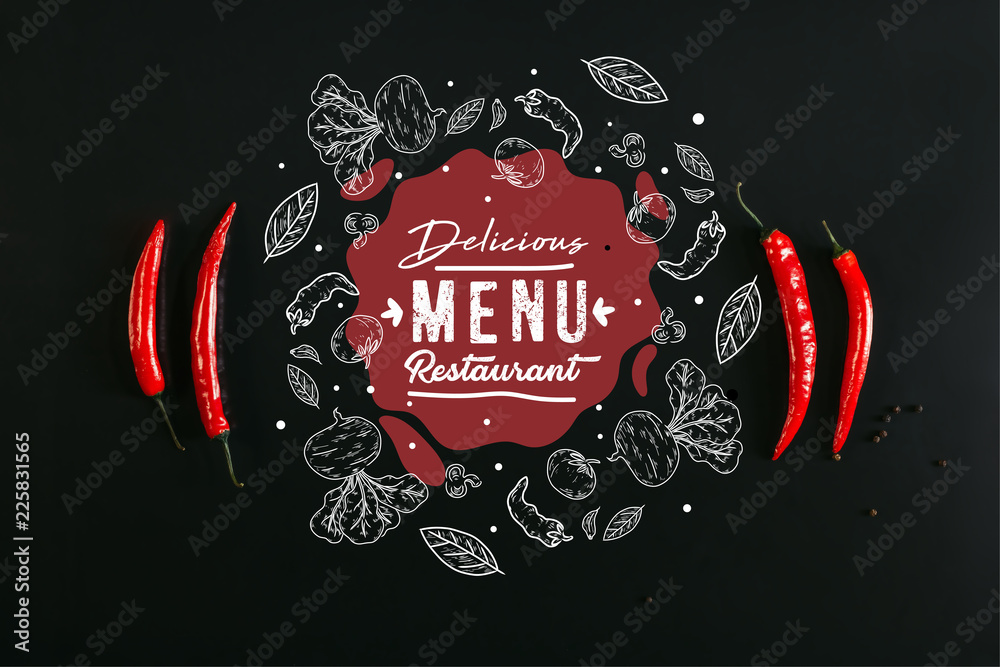 top view of red chili peppers and peppercorns on black background with ...