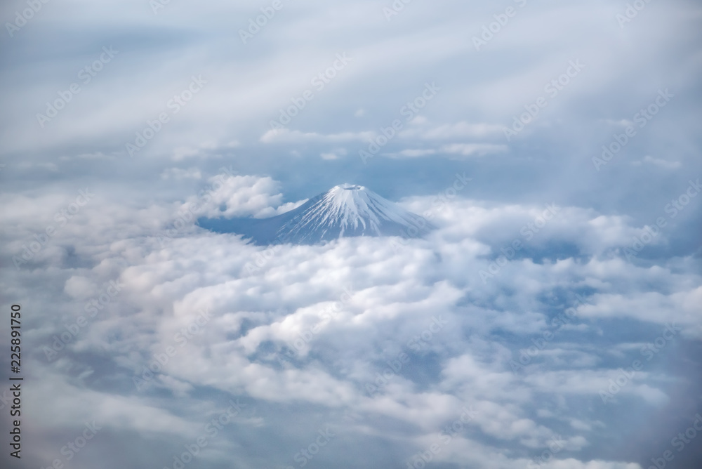 Top view of Fuji mountain and many clouds. View from window seat of ...