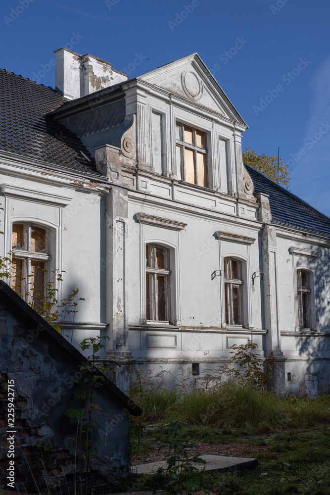 old ruined manor house. Old park with a ruined mansion. Ruined monument ...