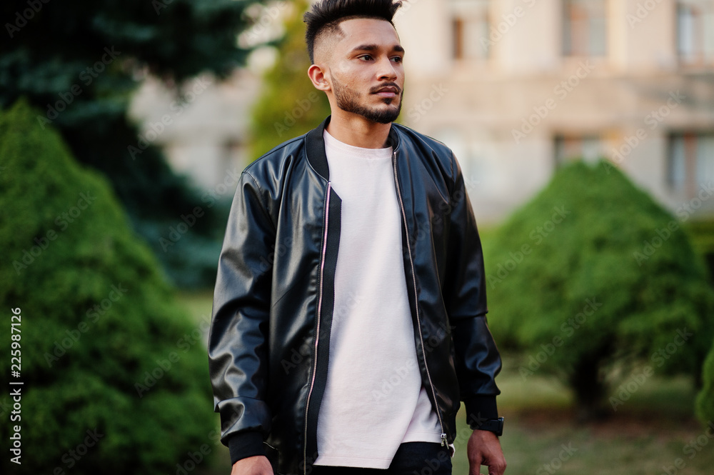 Stylish indian beard man at black leather jacket. India model posed at ...