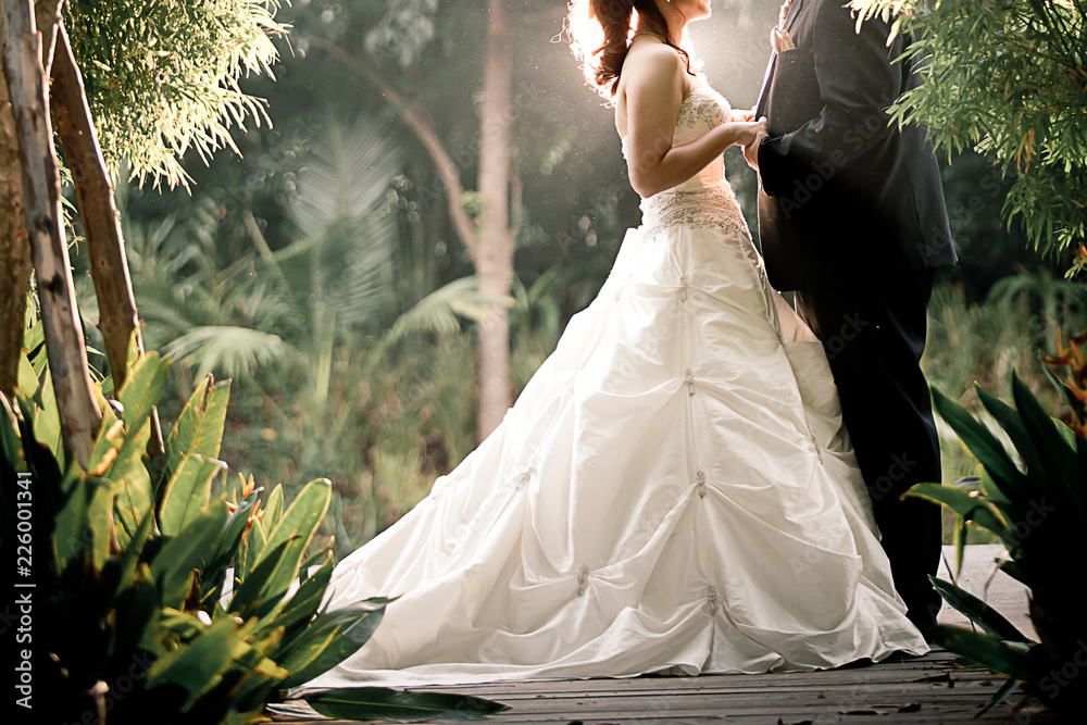 wedding couple enjoying romantic moments outside on a summer .Happy ...