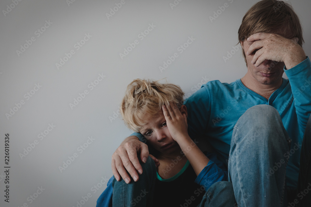 sad child with stressed father, family problems, sorrow Stock Photo ...