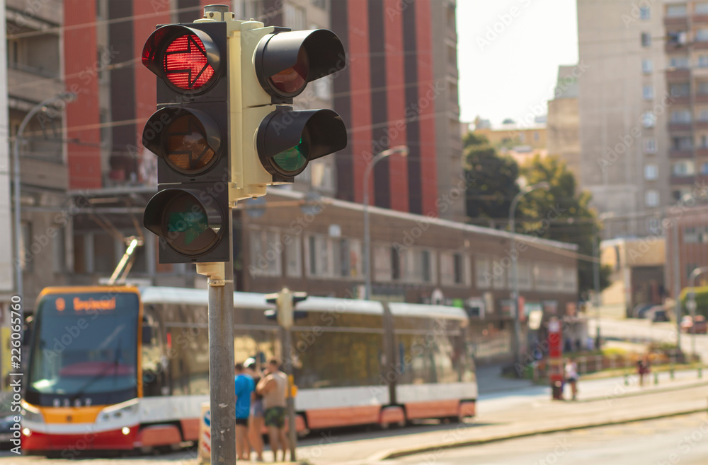 Traffic light shines red against the background of the tram Stock Photo ...