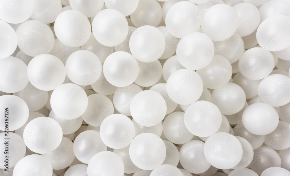 Top view white plastic bubbles pool texture. Playground background ...