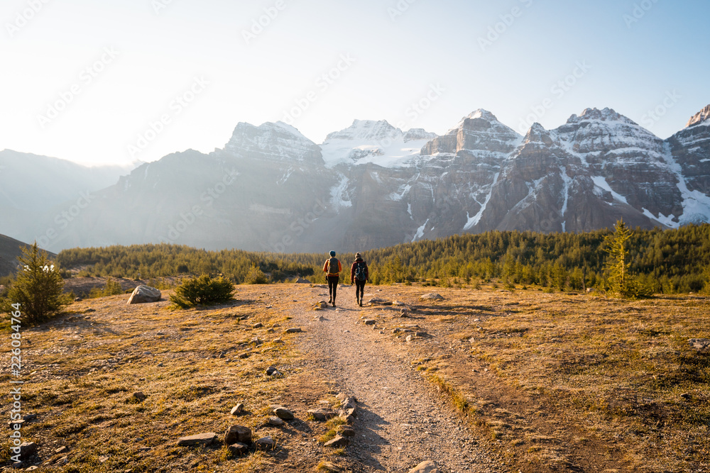 Tourists on mountain path Stock Photo | Adobe Stock