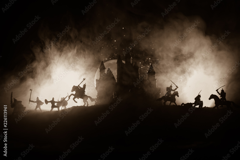Medieval battle scene with cavalry and infantry. Silhouettes of figures ...