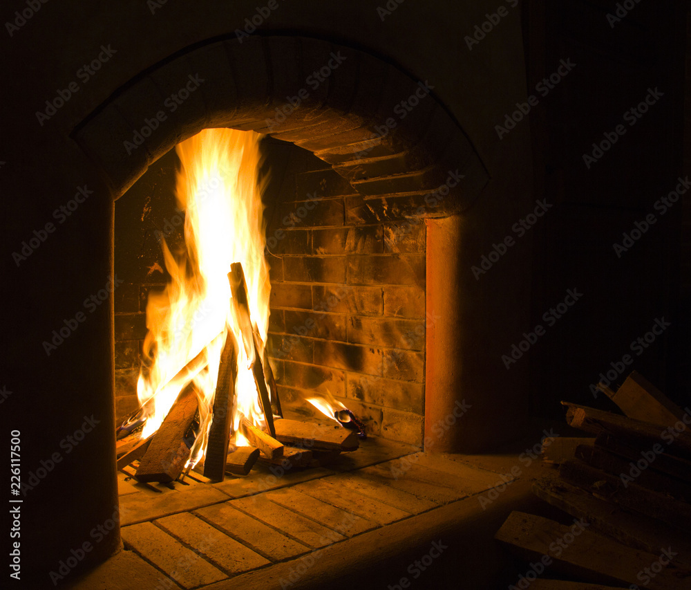 Burning Fireplace At Night