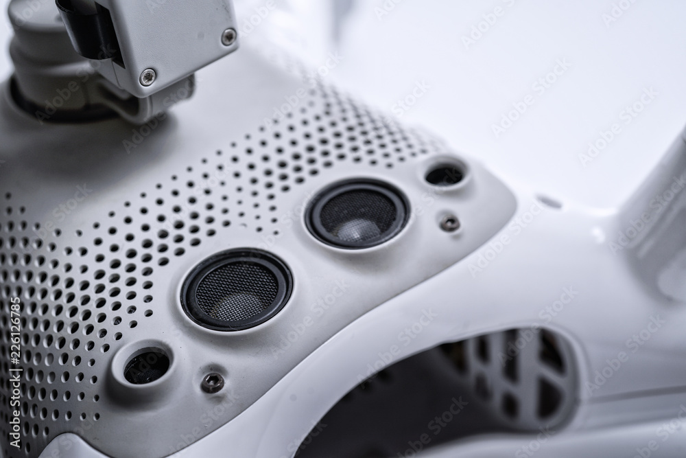 A white drone ultrasonic sensor underneath the drone body for obstacle ...