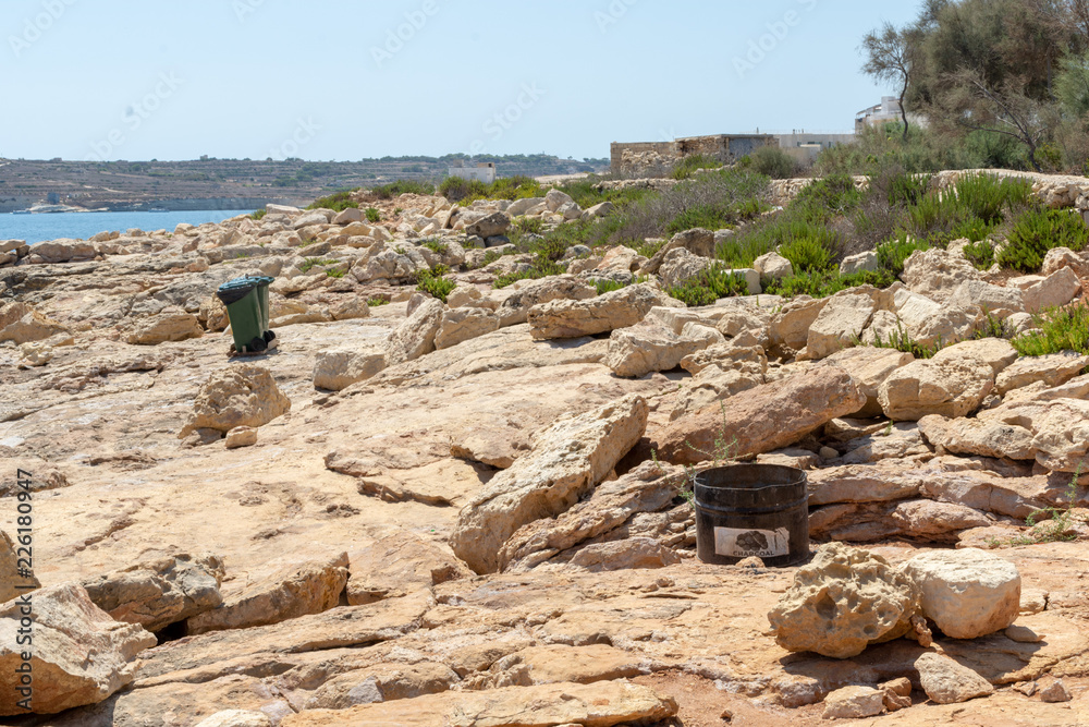 The rocky beach at Wara L-Jerma Bay, Marsaskala, Malta. Stock Photo ...