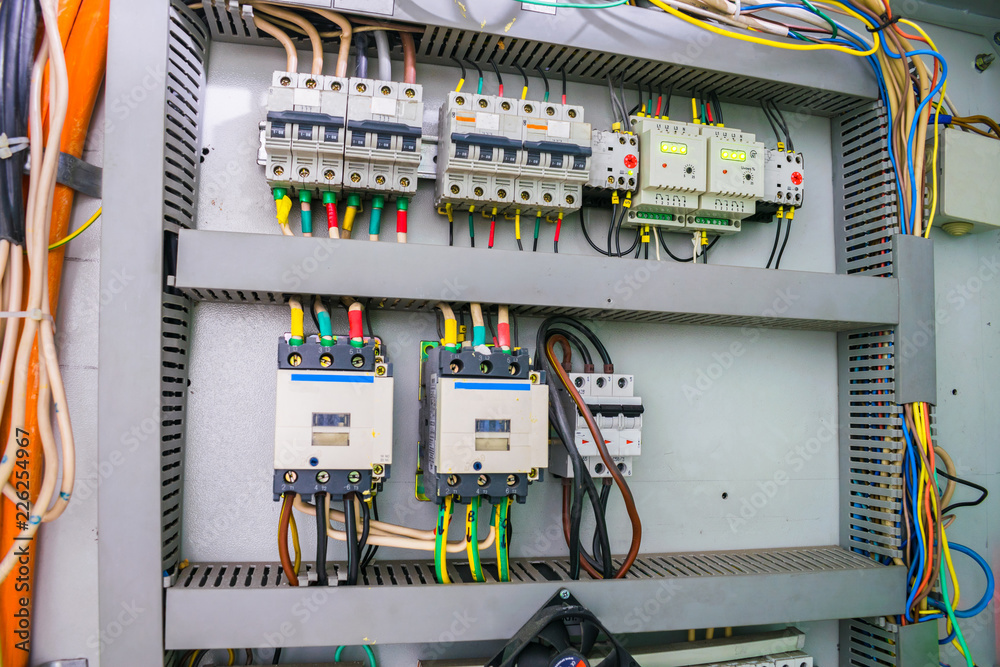 fuse box with an electric relay and automatic machines. electric board ...