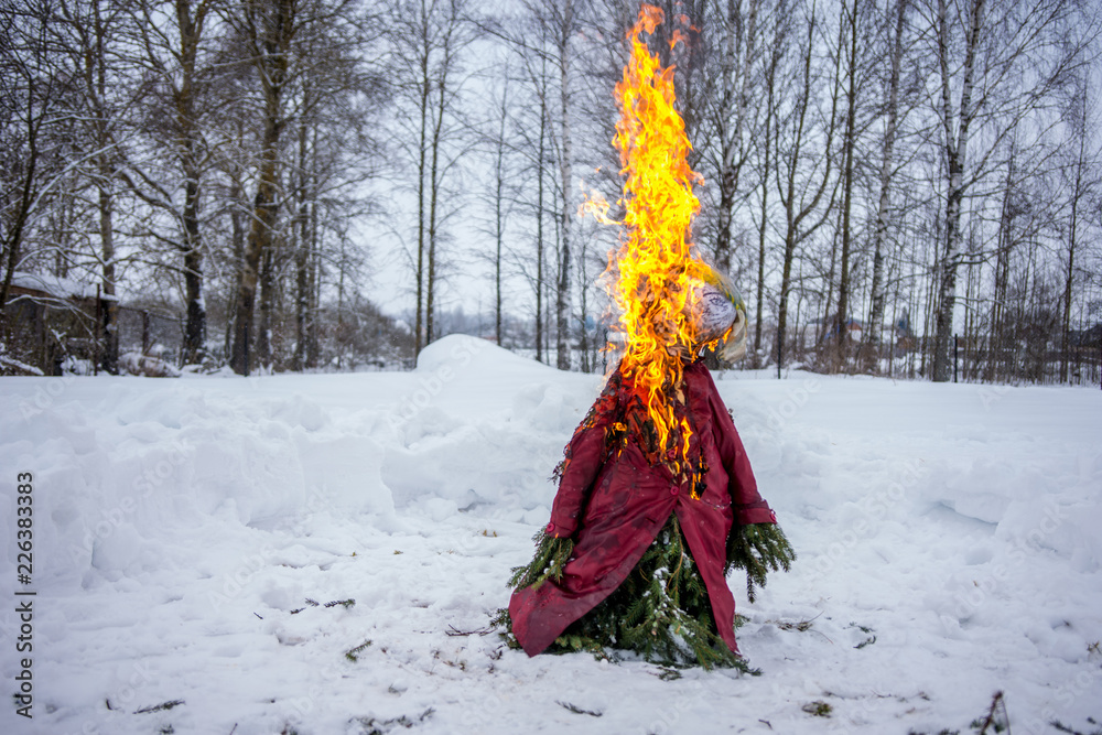 the effigy is lit on Shrove Tuesday in Russia Stock Photo | Adobe Stock