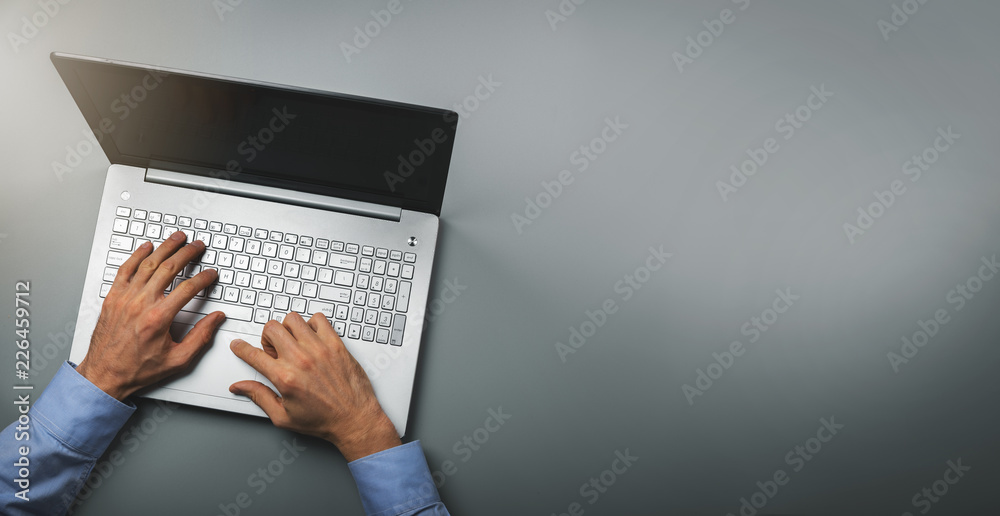 man typing on laptop computer. top view copy space Stock Photo | Adobe ...