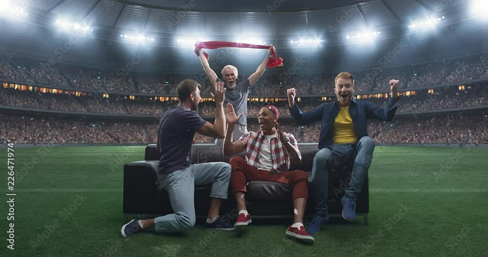 Group of fans are watching a soccer moment and celebrating a goal ...