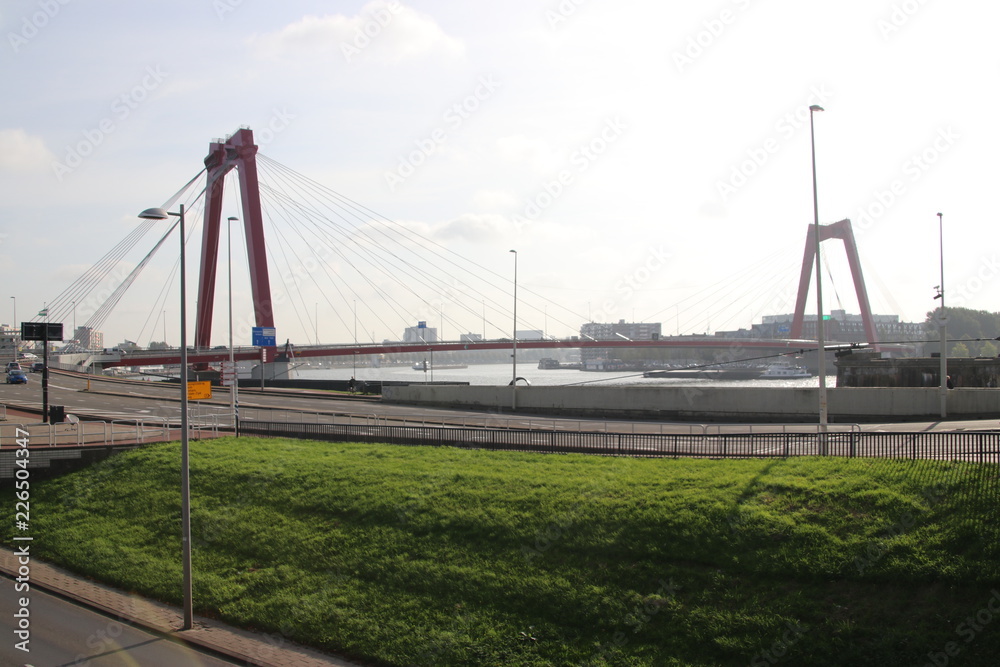 The red willemsbrug bridge in Rotterdam over river Nieuwe Maas to ...