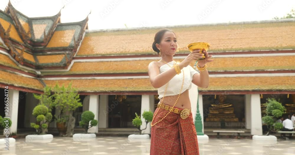 beautiful asian woman in thai traditional dress dancing traditional ...