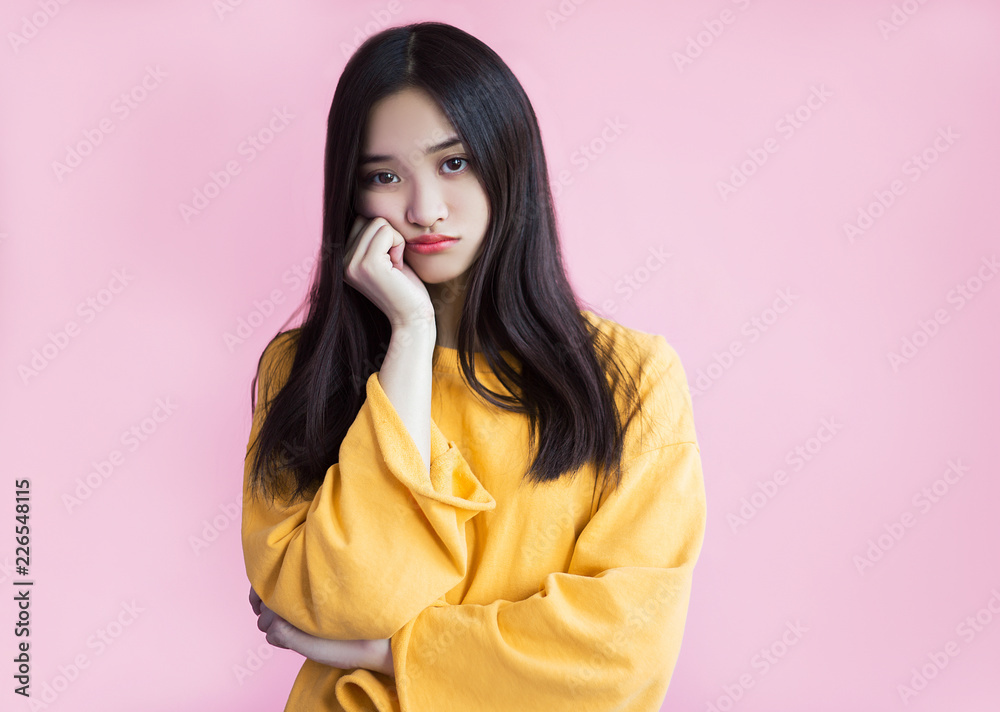 Resentment, boredom, pouting lips. Boring, dull face. Offended girl ...