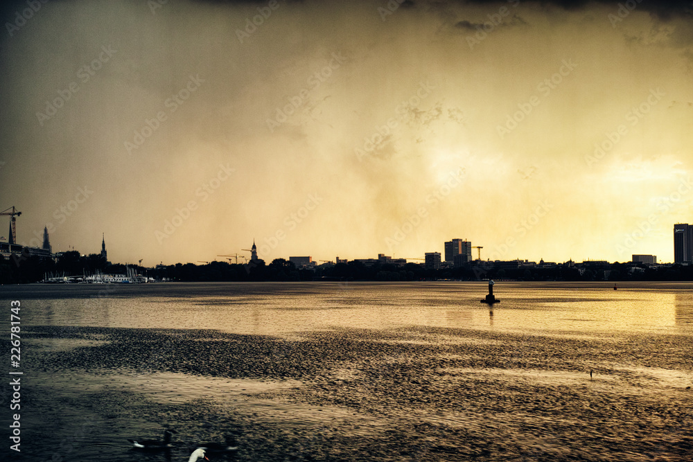 Strom Alster Lake in Hamburg Germany duck famous city park dramatic ...