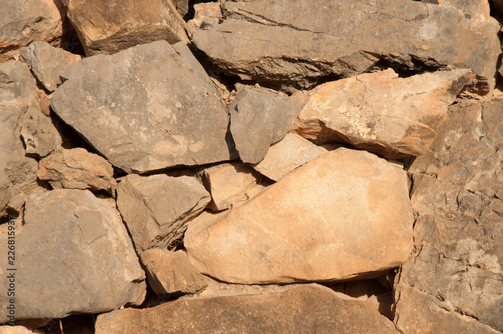 big pile of rocks and boulders piled with beautiful sunset light, Stock ...