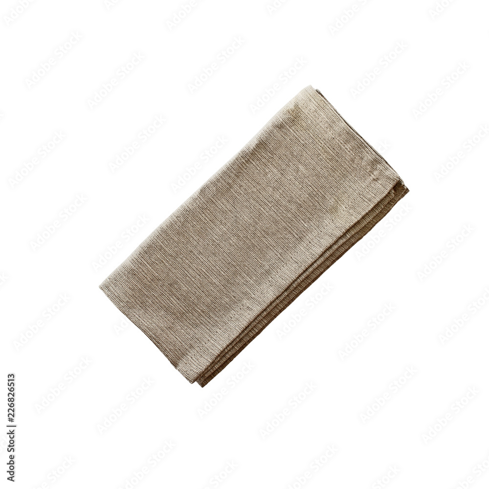 Folded linen napkin isolated over a white background with clipping path ...