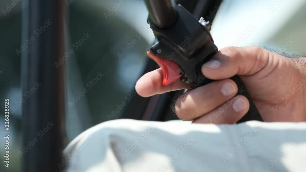 Male hand controlled helicopter, close up. The helicopter pilot holding ...