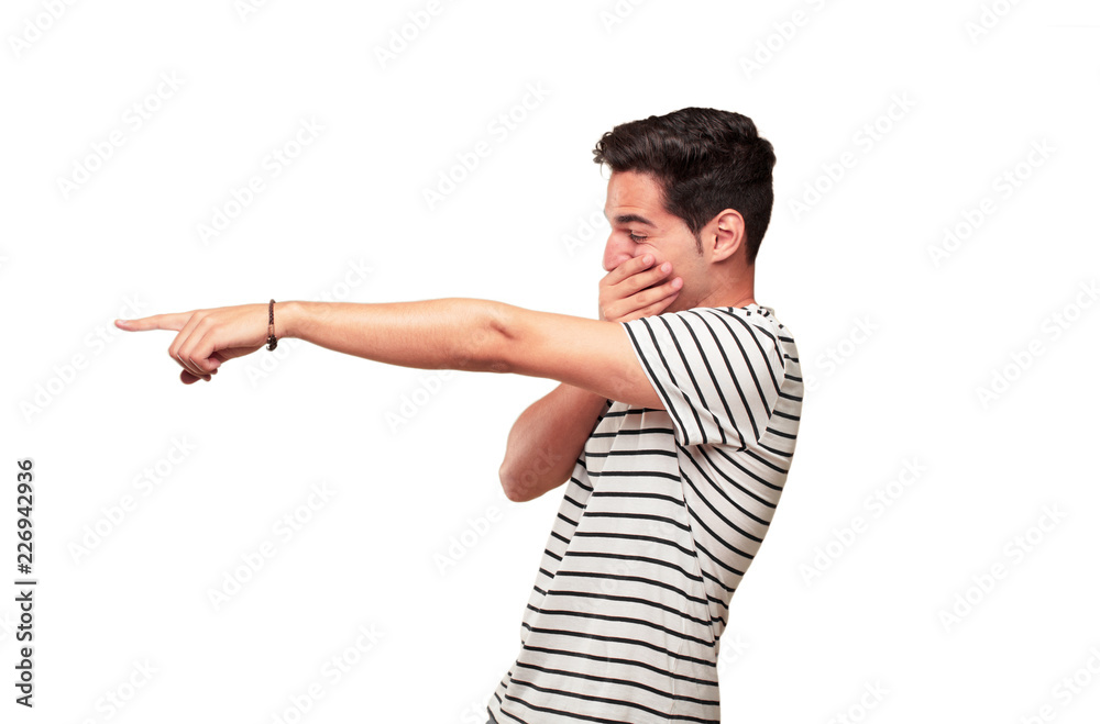 Young handsome tanned man laughing hard at something hilarious and ...