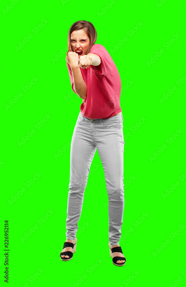 young woman full body. with an angry, aggressive and menacing pose ...