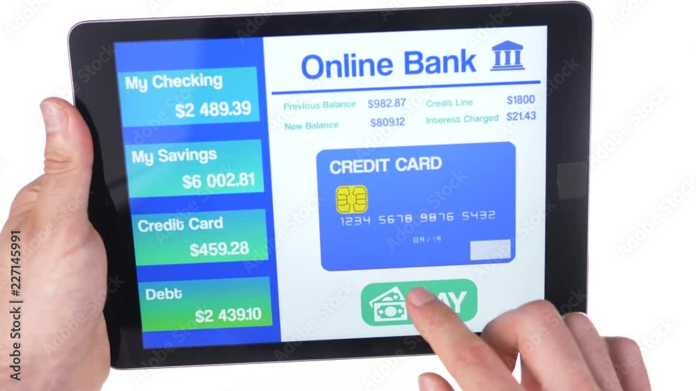 Paying the credit card bill online with a tablet app. Mobile banking ...