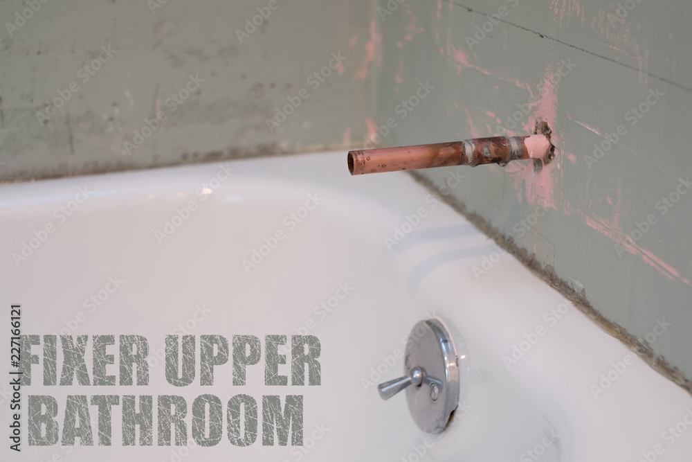 BATHTUB WITH COPPER TUBING FOR DOWNSPOUT READY FOR INSTALLING NEW TILES WITH WORD FIXER UPPER ...