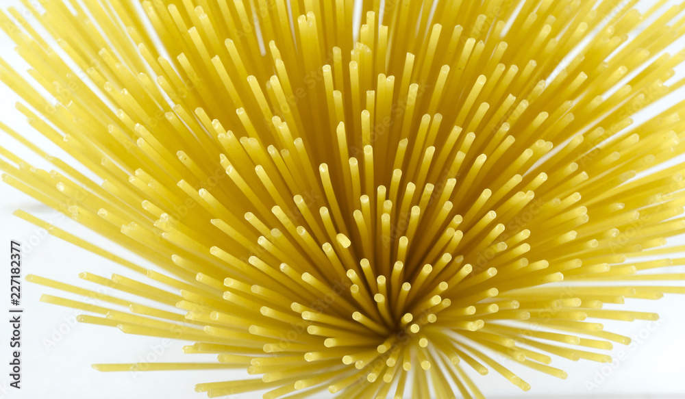 Yellow long spaghetti on white background Top view, Copy space for ...