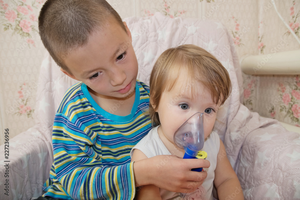 sick children - boy make nebulizer mask for inhalation for little ...