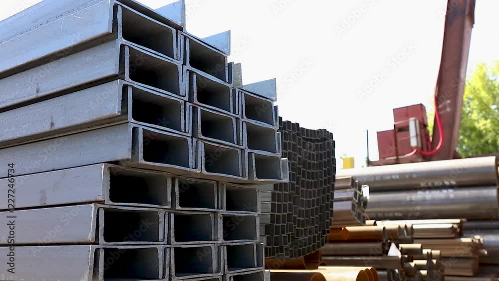 The metal channel laid in rows in the open metal warehouse, the large ...