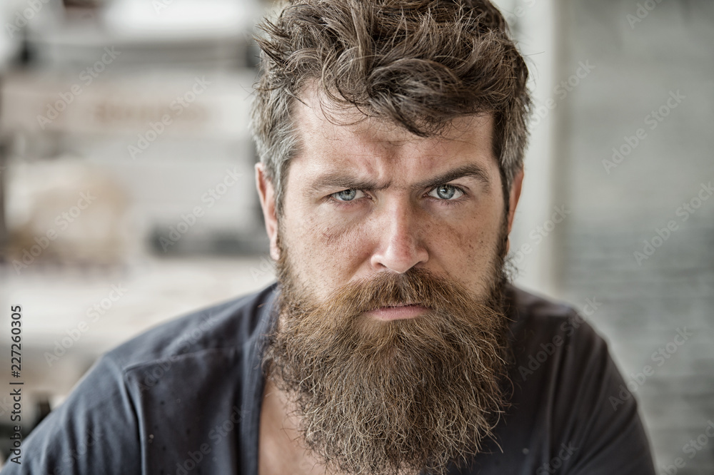 Man brutal bearded hipster thoughtful mood defocused background. Macho ...
