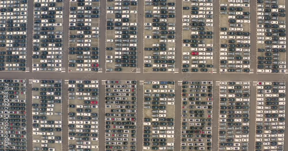 Aerial view of a new car depot, where you can see thousands of cars ...
