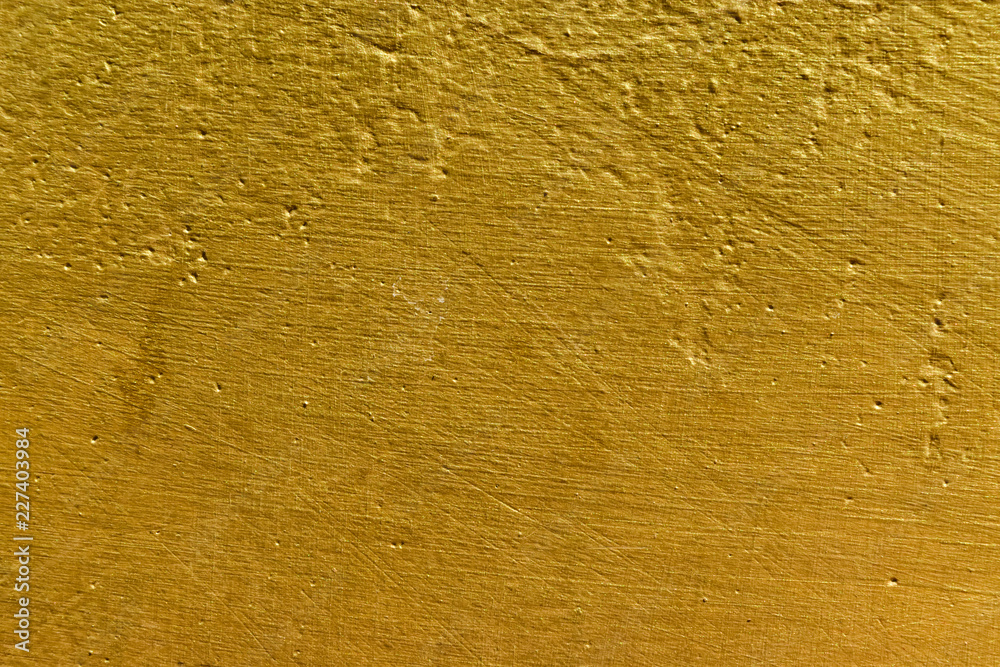 Abstract gold concrete wall texture. Golden on cement wall background ...