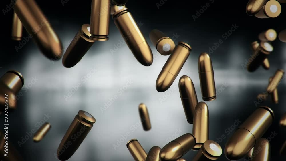 Animation falling of bullets different calibers on dark and blurred ...